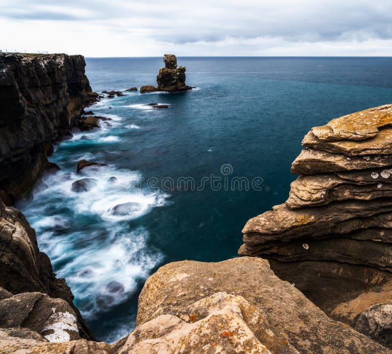 Wild Shoreline and Cliffs Drop into a Deep Blue Atlantic Ocean Stock ...