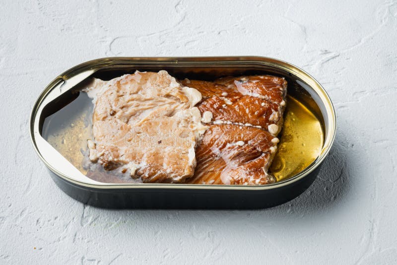 Canned Smoked Trout Fillets, on Wooden Cutting Board, on Black ...
