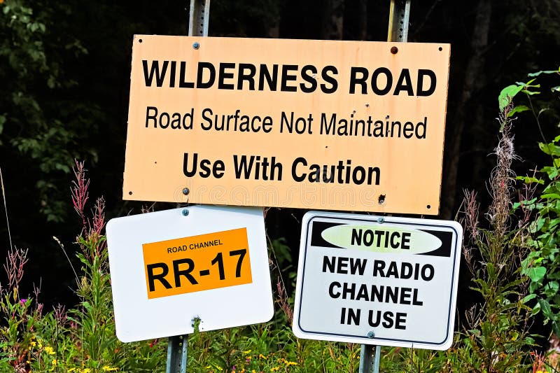 A Wilderness Road, Use with Caution Sign Stock Photo - Image of ...