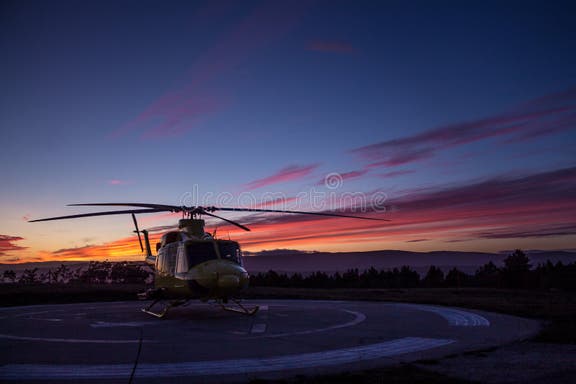 Helicopter in sunset stock photo. Image of awesome, silhouette - 100465688