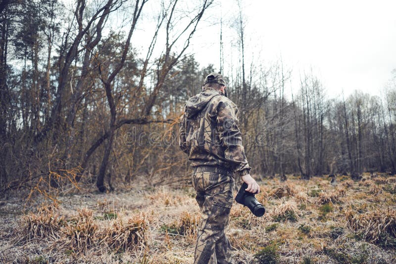 Wildlife Photographer in the Forest with a Camera Stock Photo - Image ...