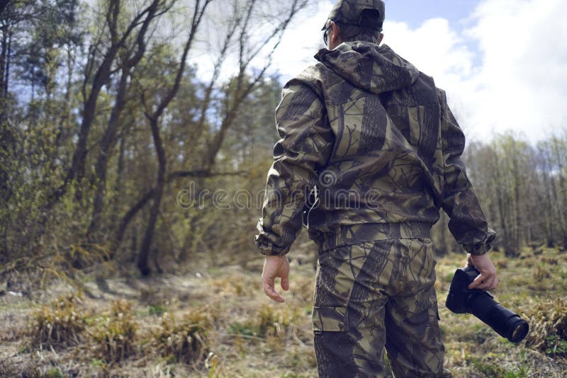 Wildlife Photographer in the Forest with a Camera Stock Image - Image ...