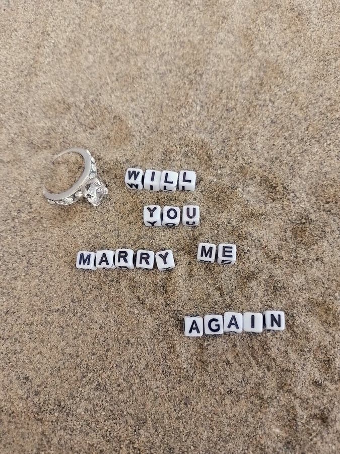 Marry Me Written in Sand on Beach Stock Photo - Image of romantic ...