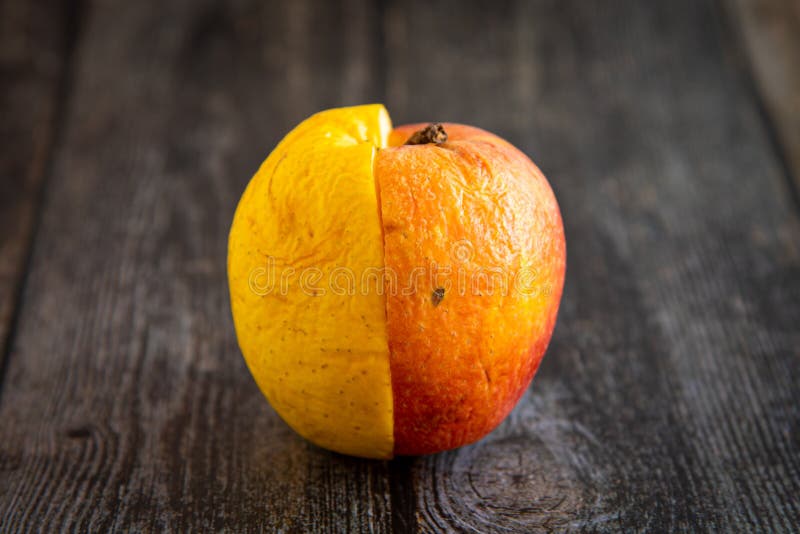 Wilted Rotten Half Apples on a Wooden Surface Stock Image - Image of ...