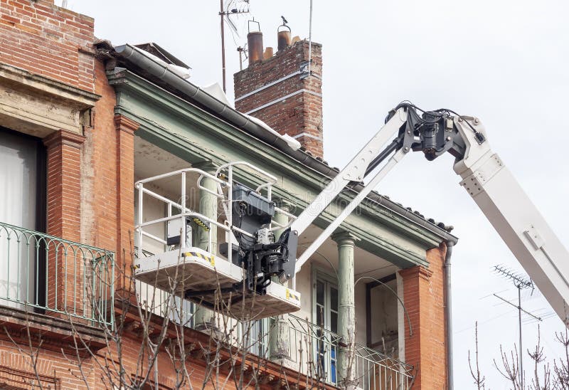 A Winch Raised To the Wall of an Old House Stock Image - Image of ...