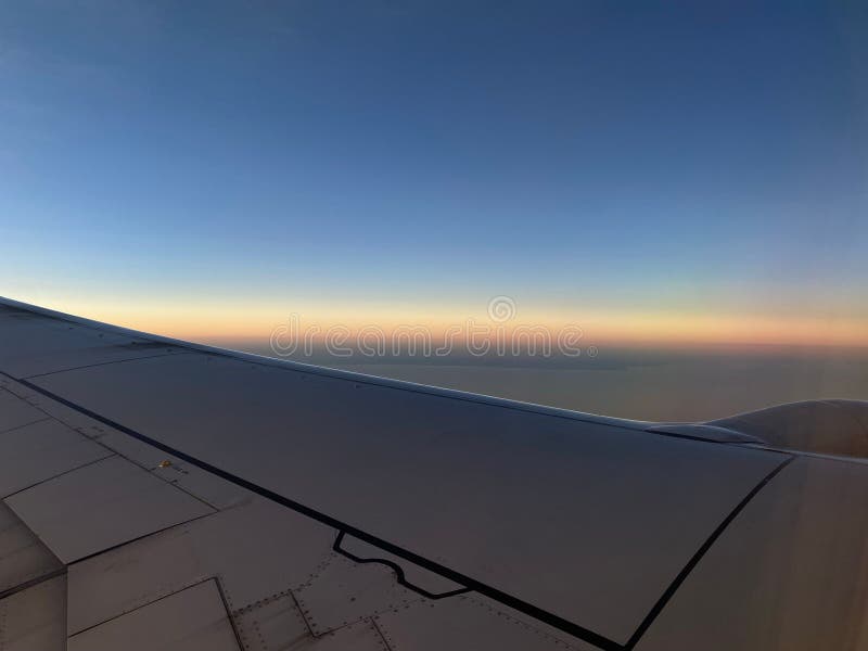Wind of the Airplane with a Sunset View in the Background Editorial ...