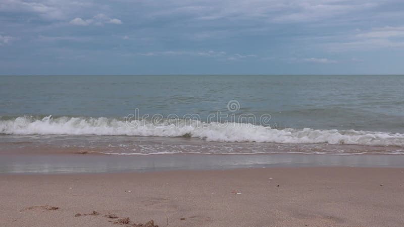 Wind Blowing Over Sea Waves on the Beach in Daytime. the Waves Hitting ...