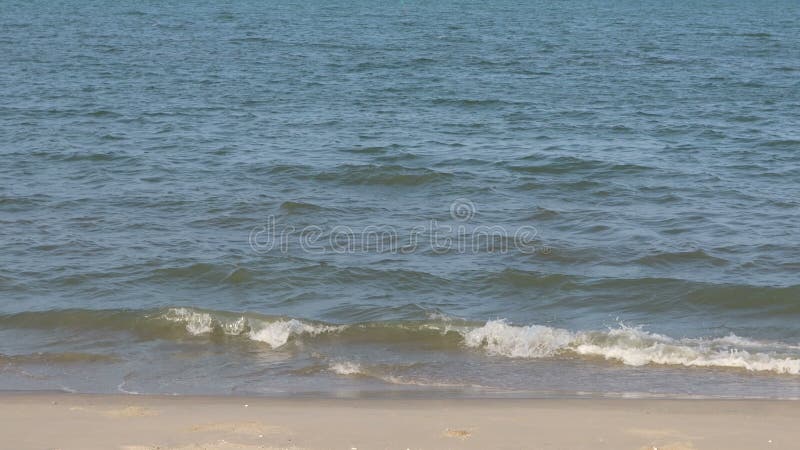 Wind Blowing Over Sea Waves on the Beach in Daytime. the Waves Hitting ...
