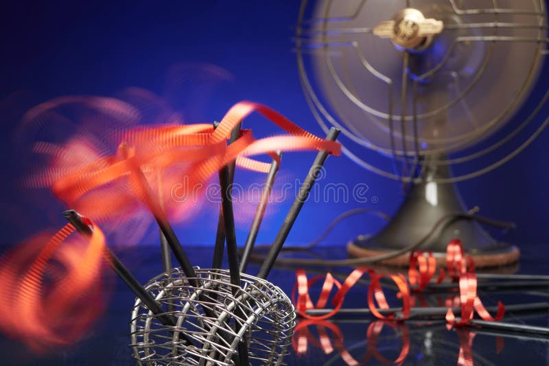 Antique Fan Blowing Red Ribbons Stock Photo - Image of performance ...