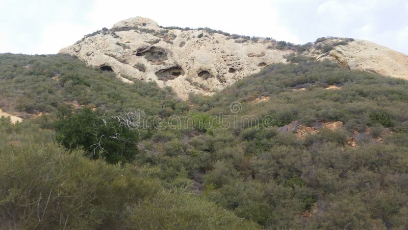 Wind Caves on the Side of a Mountain Stock Image - Image of state, sand ...