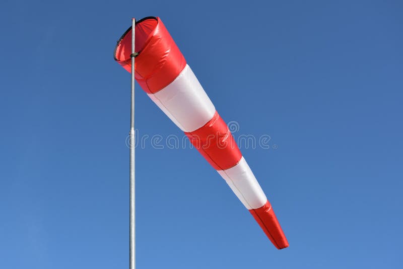 Wind cone against blue sky stock image. Image of mast - 113308105