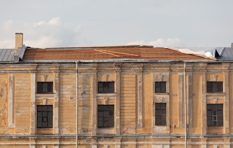 Wind-damaged Roof of a Building Stock Photo - Image of destroyed ...