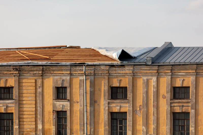 Wind-damaged Roof of a Building Stock Photo - Image of rooftop, blow ...