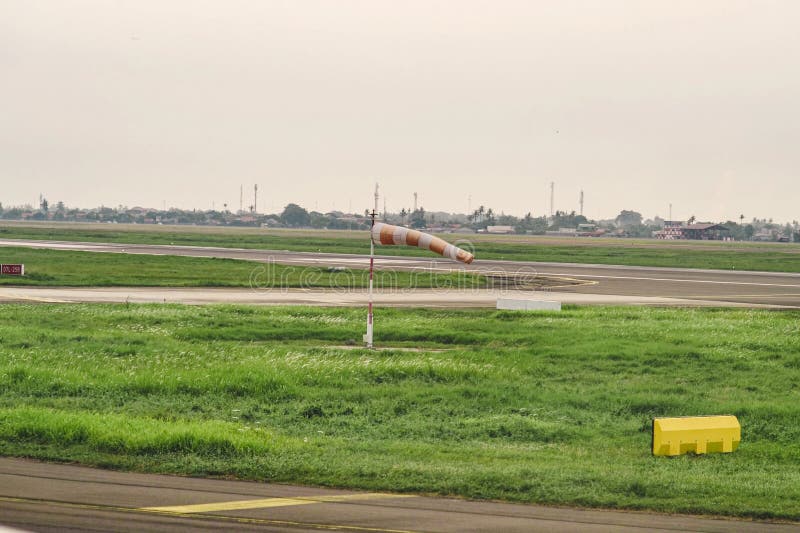 Windsock As a Wind Indicator at the Airport. Stock Photo - Image of ...