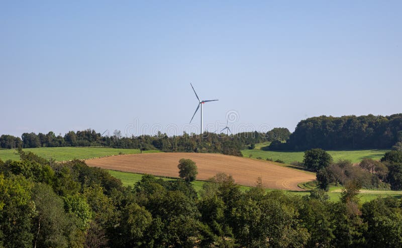 Wind Energy in Nature: Wind Turbines in a Green Environment Stock Photo ...