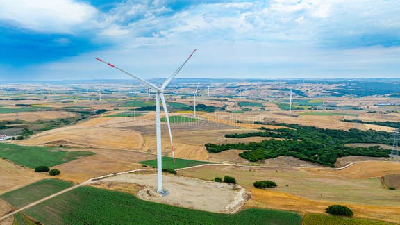 Aerial View of Wind Energy Turbines Located in Fertile Agricultural ...