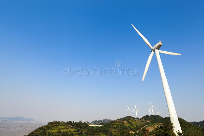 Wind farm at the beach stock photo. Image of industry - 27711022