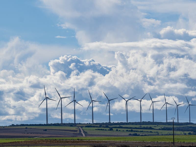 Wind Farm between Crop Fields. Blue Sky with Clouds Stock Image - Image ...