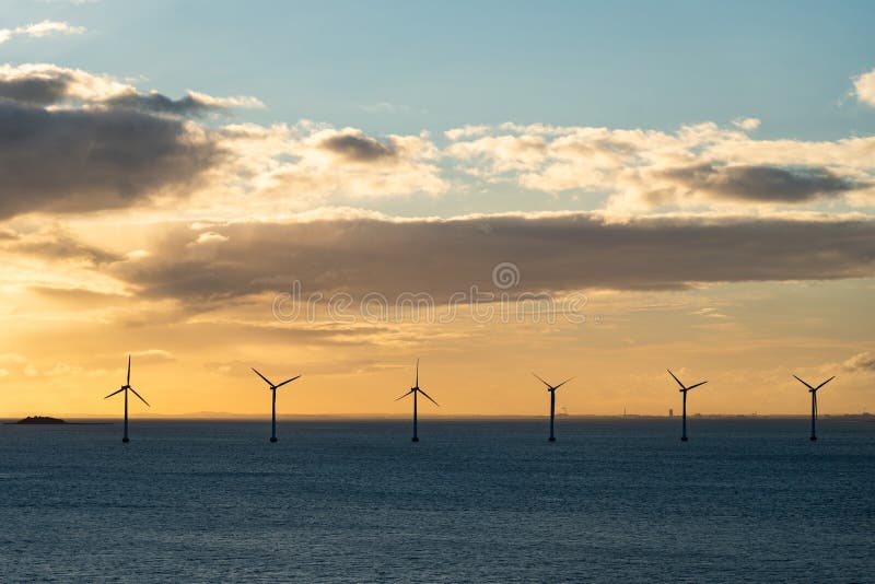 Wind Farm Generate Electricity in the Open Sea during Sunset ...