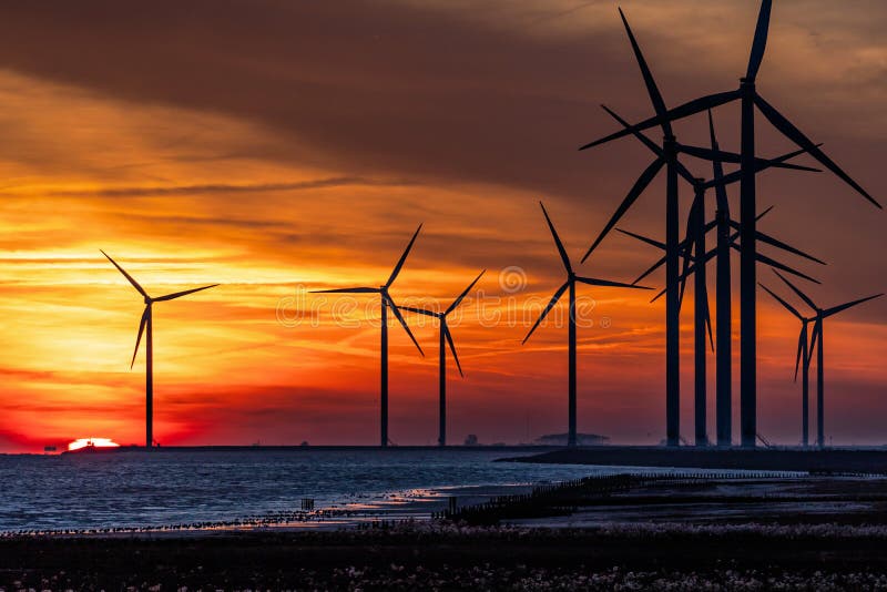 Wind farm stock photo. Image of afterglow, moody, mills - 259773932