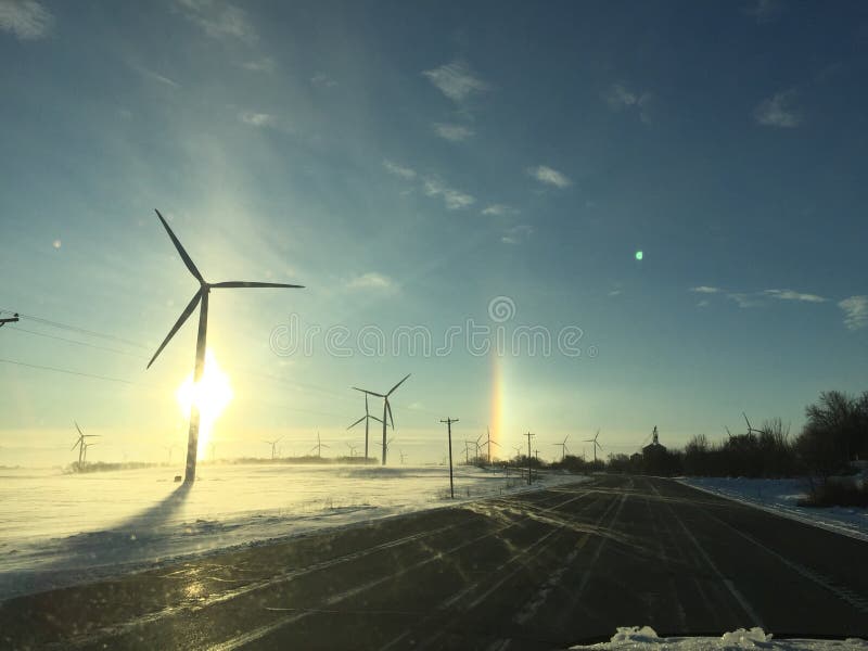 Wind farm sun dog stock photo. Image of wind, winter - 105709088