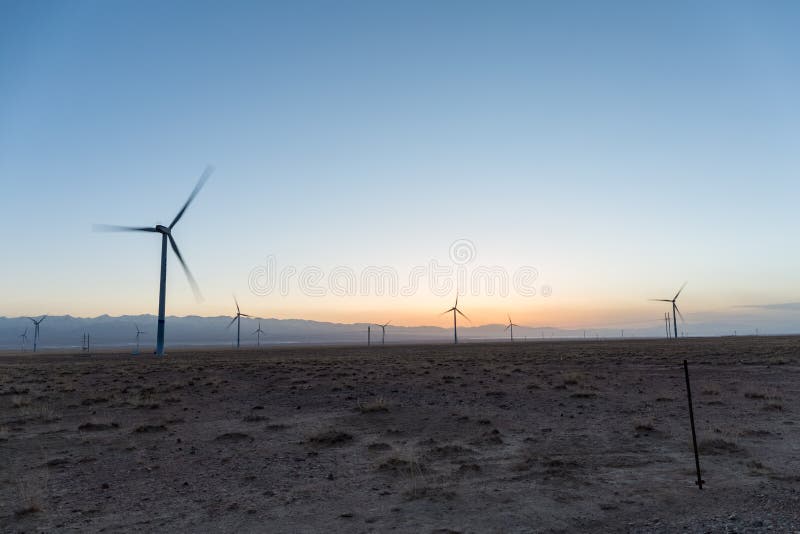 Wind farm in sunset stock photo. Image of industry, gobi - 90403138