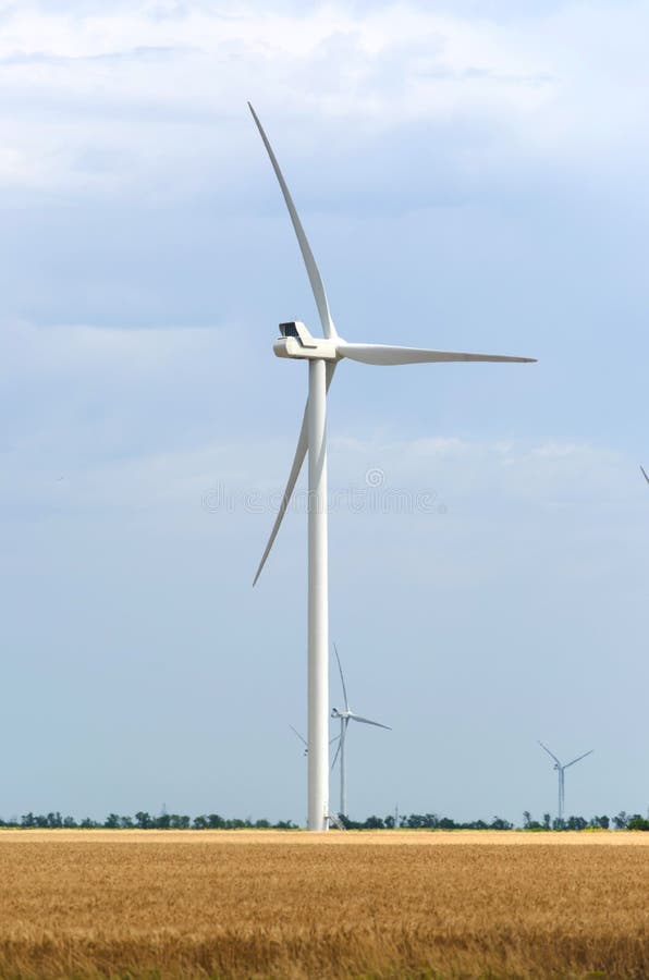 A Wind Farm in the Wide Spread Field Stock Photo - Image of horizont ...