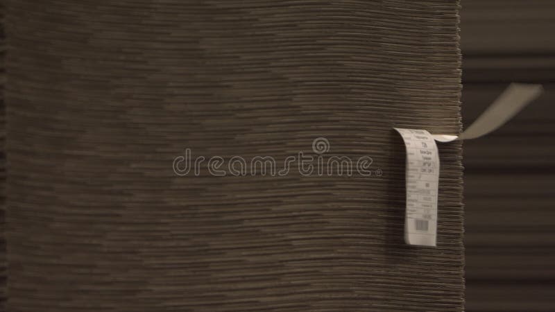 Wind Flatters Labels on Cardboard Stack in Warehouse Stock Video ...