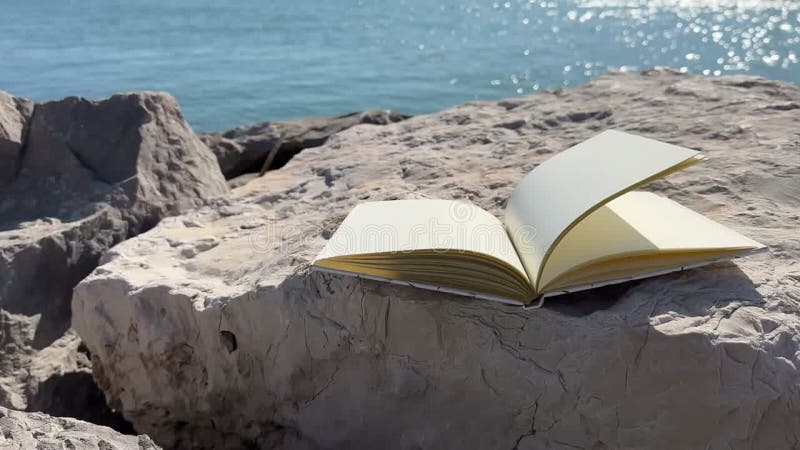 Wind Flipping Notebook Pages on Sea Background Stock Video - Video of ...