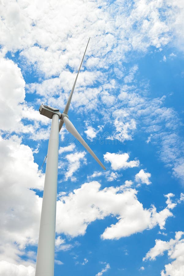 The Wind Generator is in Bright Cloudy Sky. Eco Energy Concept Stock ...