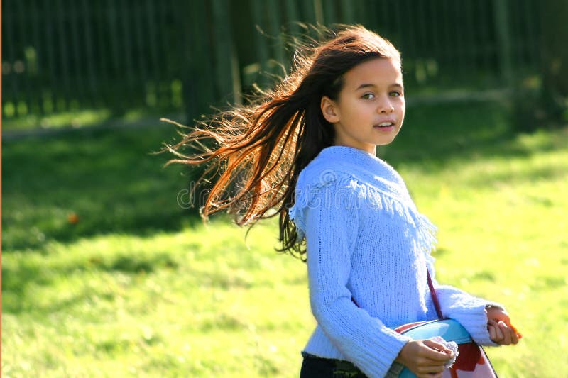Wind in her hair stock image. Image of child, wind, play - 3293113