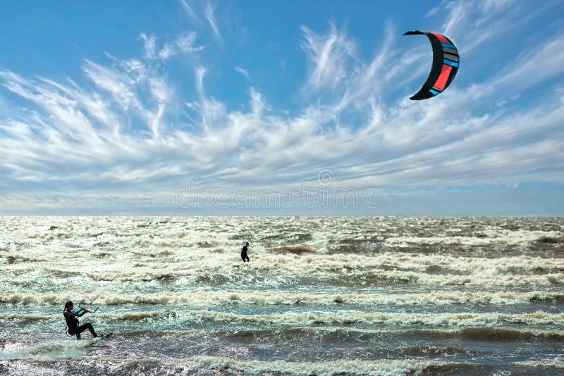 Wind And Kite Surfers In Clear Sea With Blue Sky. Stock Photo - Image ...