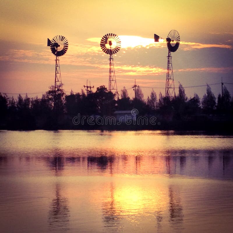 Wind mill stock photo. Image of sunset, mill, surface - 48853948