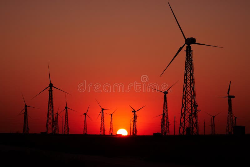 Wind Power Generation, Wind Turbines on Farmland with Sunset Stock ...