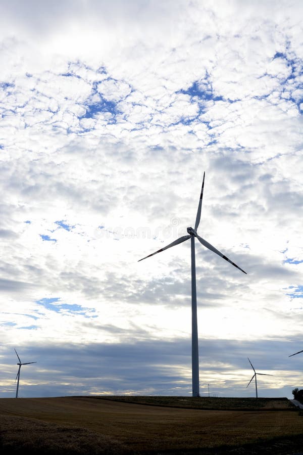 Wind Power Plant at Clouds and Sky Stock Photo - Image of machine, wind ...