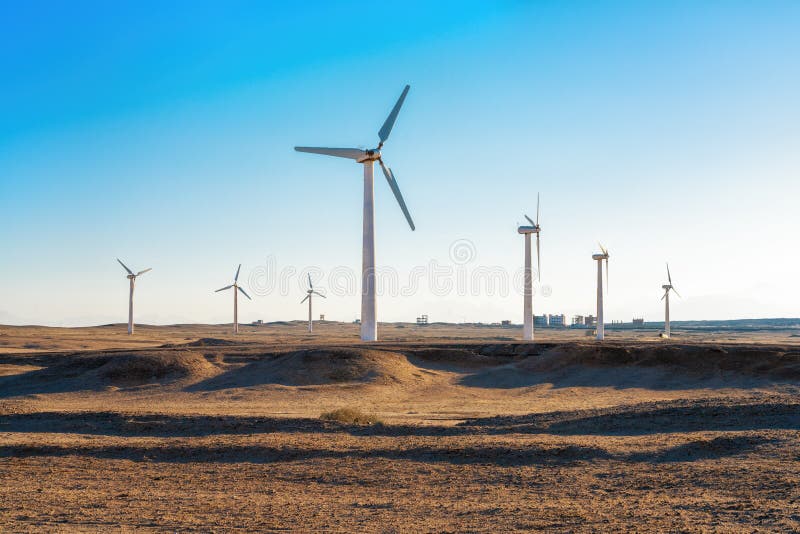 Wind Power Plants in Desert at Sunset Stock Photo - Image of ...