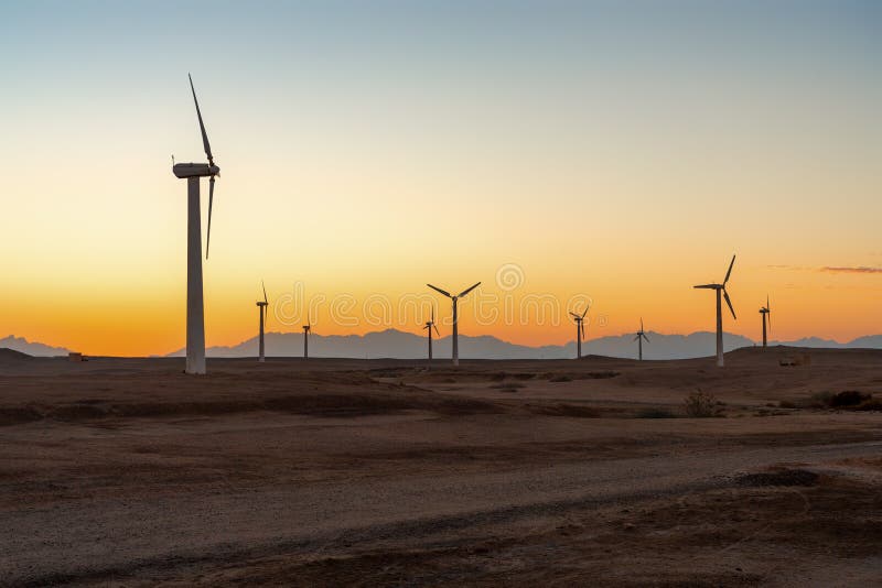 Wind Power Plants in Desert at Sunset Stock Image - Image of green ...