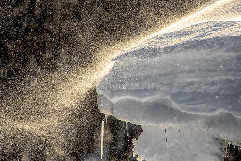 Wind pushing snow stock photo. Image of sunlight, pushing - 266710052