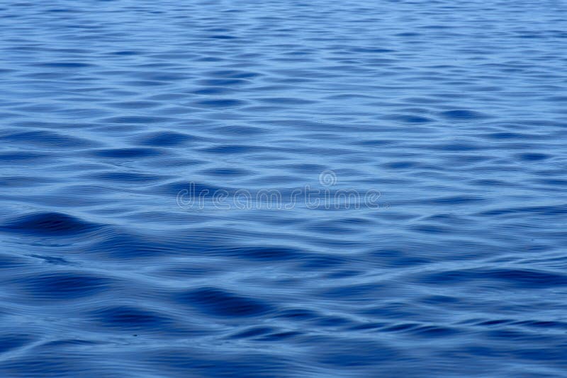 Wind Ripples on the Calm Surface of the Sea. Stock Image - Image of ...