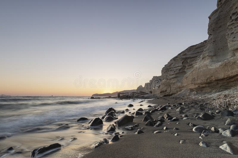 Wind-sculpted Cliffs at Sunset Stock Photo - Image of church, greek ...