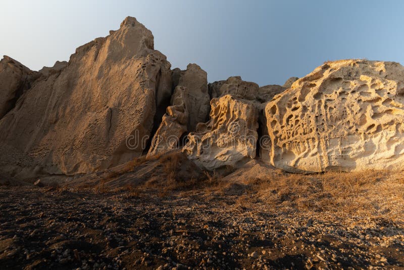 Wind-sculpted Cliffs at Sunset Stock Image - Image of cyclades ...