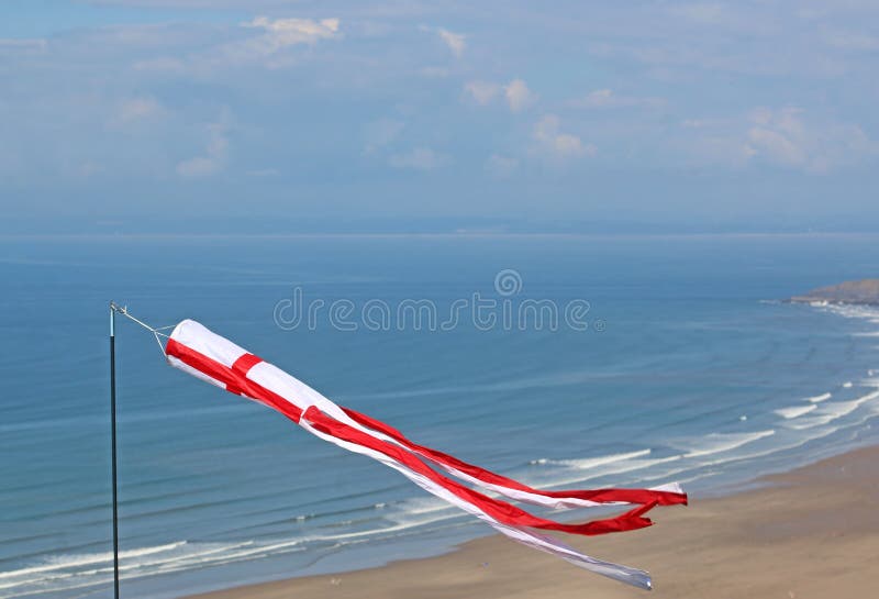Wind Sock Above Rhossili Beach in Wales Stock Image - Image of rock ...