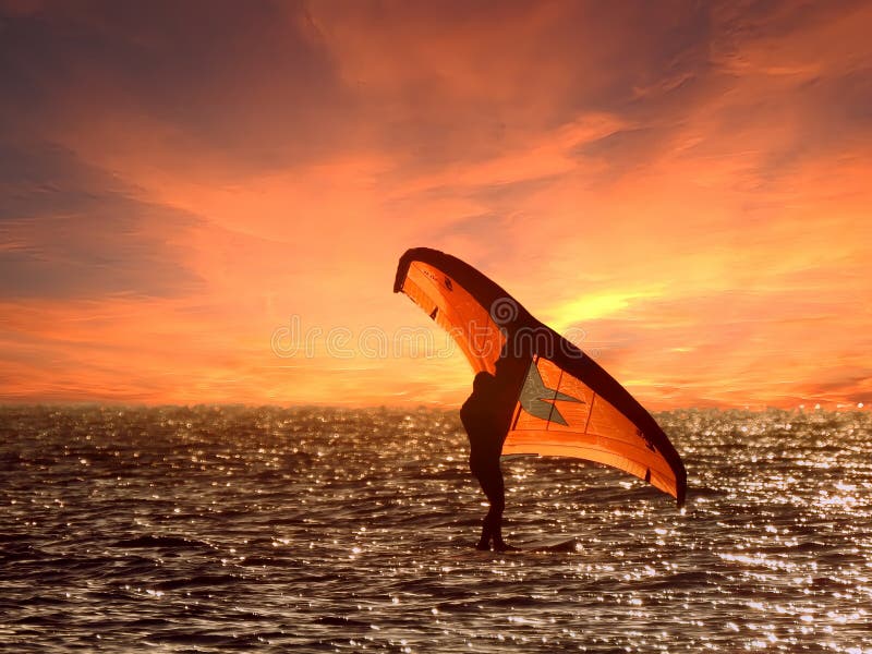 Wind surfer and sunset sky stock image. Image of orange - 311370663