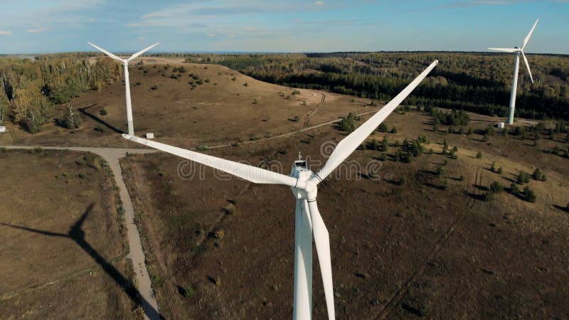 Wind Towers Working on a Big Field. Renewable Energy Concept. Stock ...