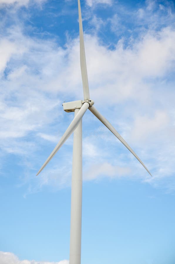 Wind turbind with blue sky stock photo. Image of wind - 128317484