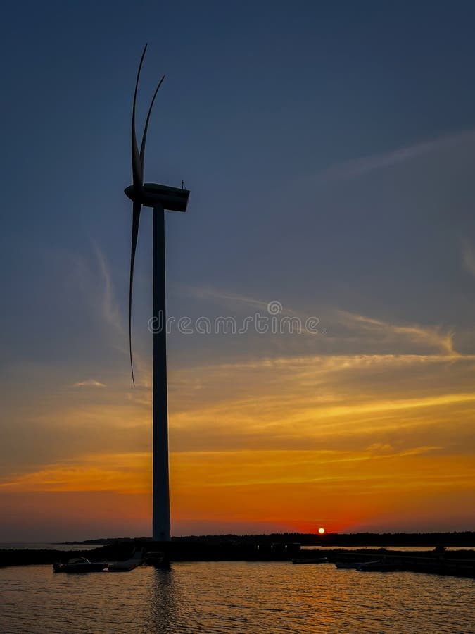 Wind Turbine Against the Backdrop of a Beautiful Sunset Stock Image ...