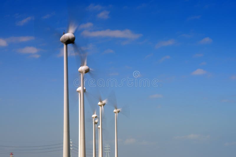 Wind Turbine Against Blue Sky Stock Photo - Image of landscape ...