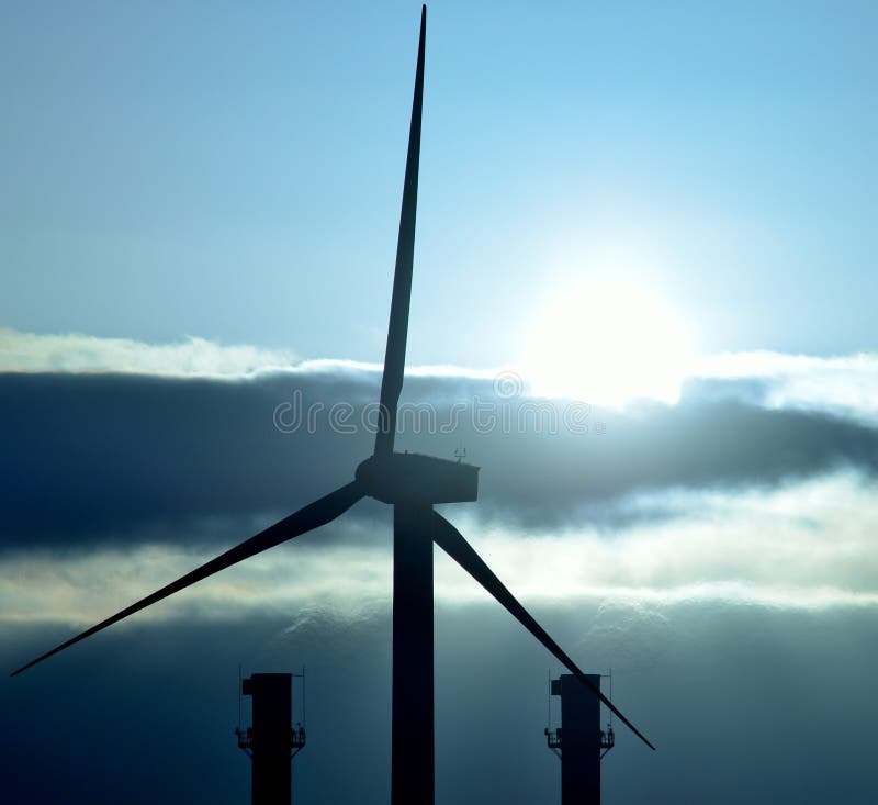 Wind Turbine and Chimneys at Sunrise Stock Photo - Image of energy ...