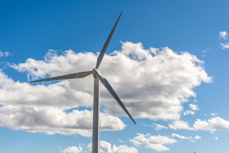 Wind Turbine on a Cloudy and Windy Day Stock Photo - Image of natural ...