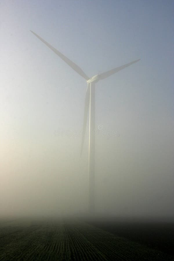 Wind Turbine Coming Up from Mist Stock Image - Image of alternator ...